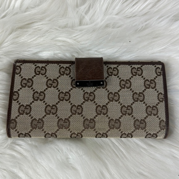 Gucci | Bags | Gucci Brown Signature Vintage Logo Trifold Wallet | Poshmark